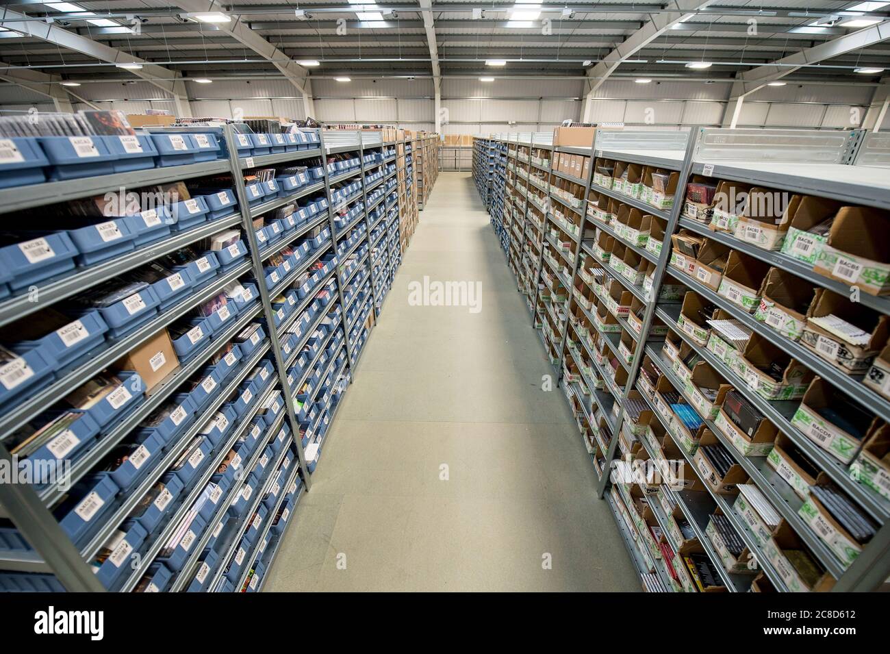 Rows of shelves and product containment in a warehouse distribution ...