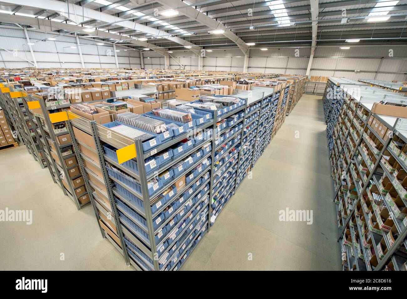 Rows of shelves and product containment in a warehouse distribution ...
