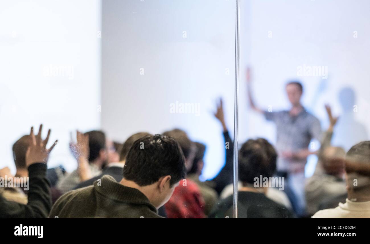 Speaker Presenting at an Academic Conference Event Stock Photo - Alamy