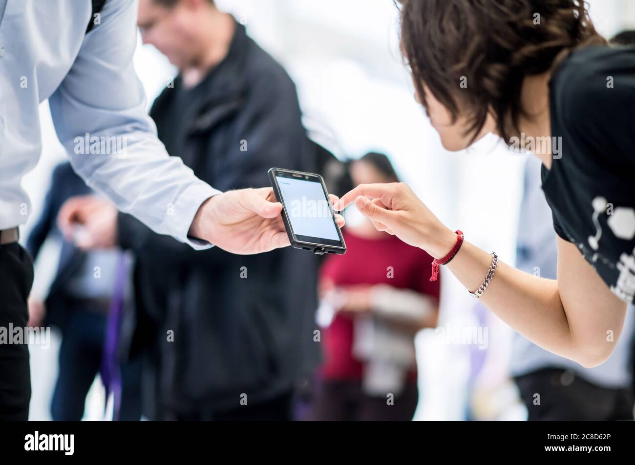 Scanning Using Smart Phone or Tablet at an Event Stock Photo - Alamy