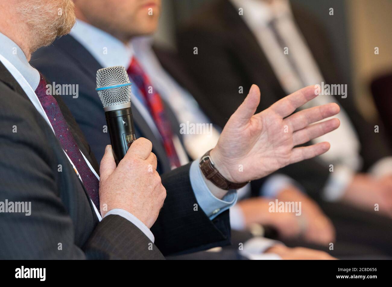 Audience Asking A Question at Business and Academic Conference Event ...