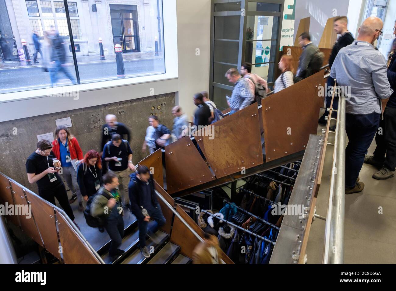 People walking on a Staircase at Business and Academic Conference Event ...