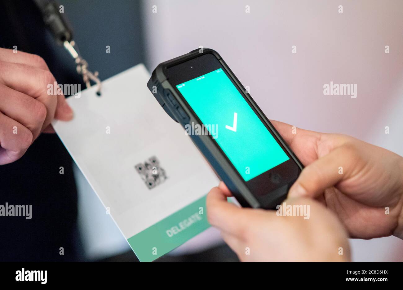 Scanning Using Smart Phone or Tablet at an Event Stock Photo - Alamy