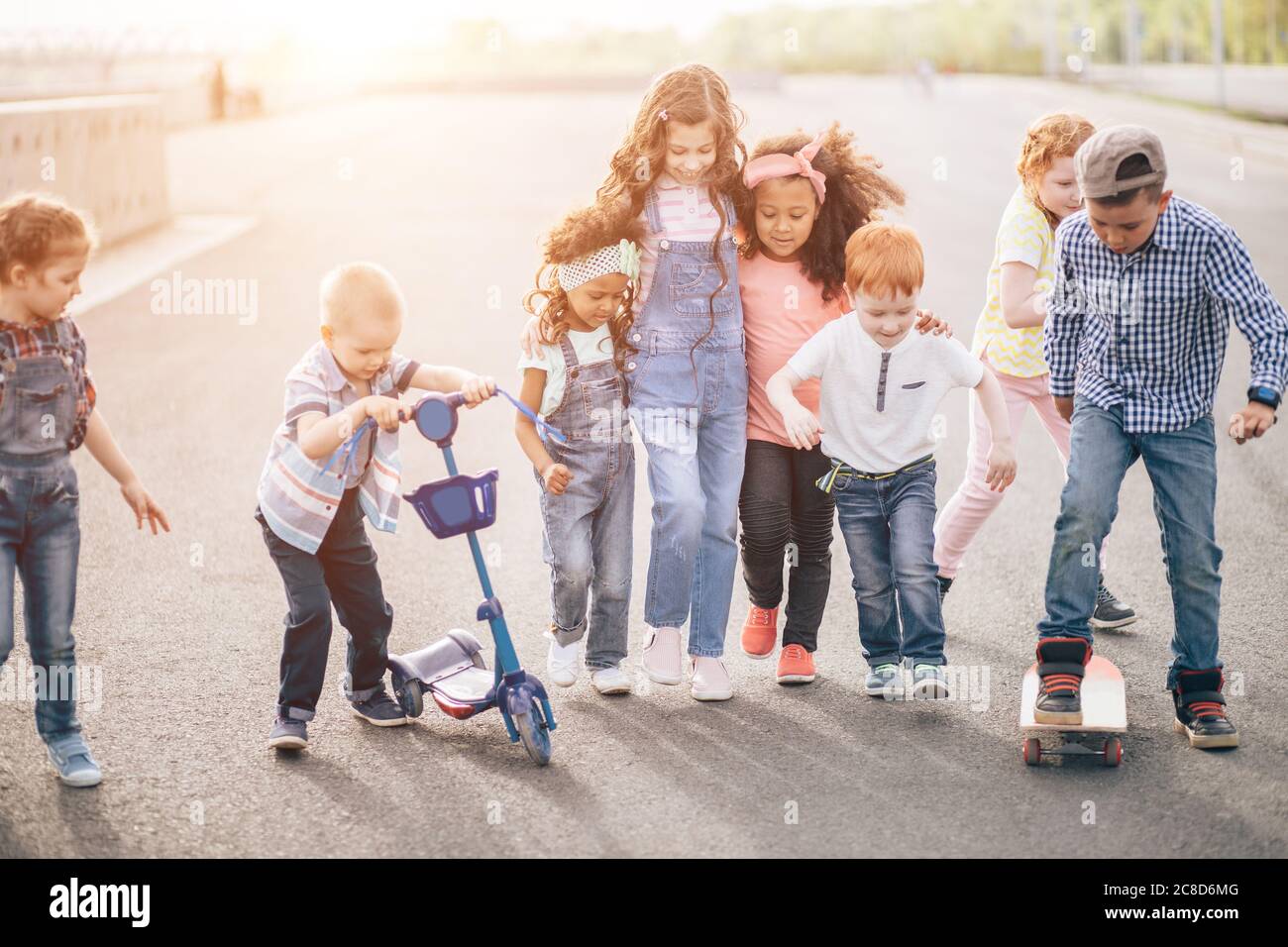 Happy kids walking holding hands. The concept of unity, friendship and ...