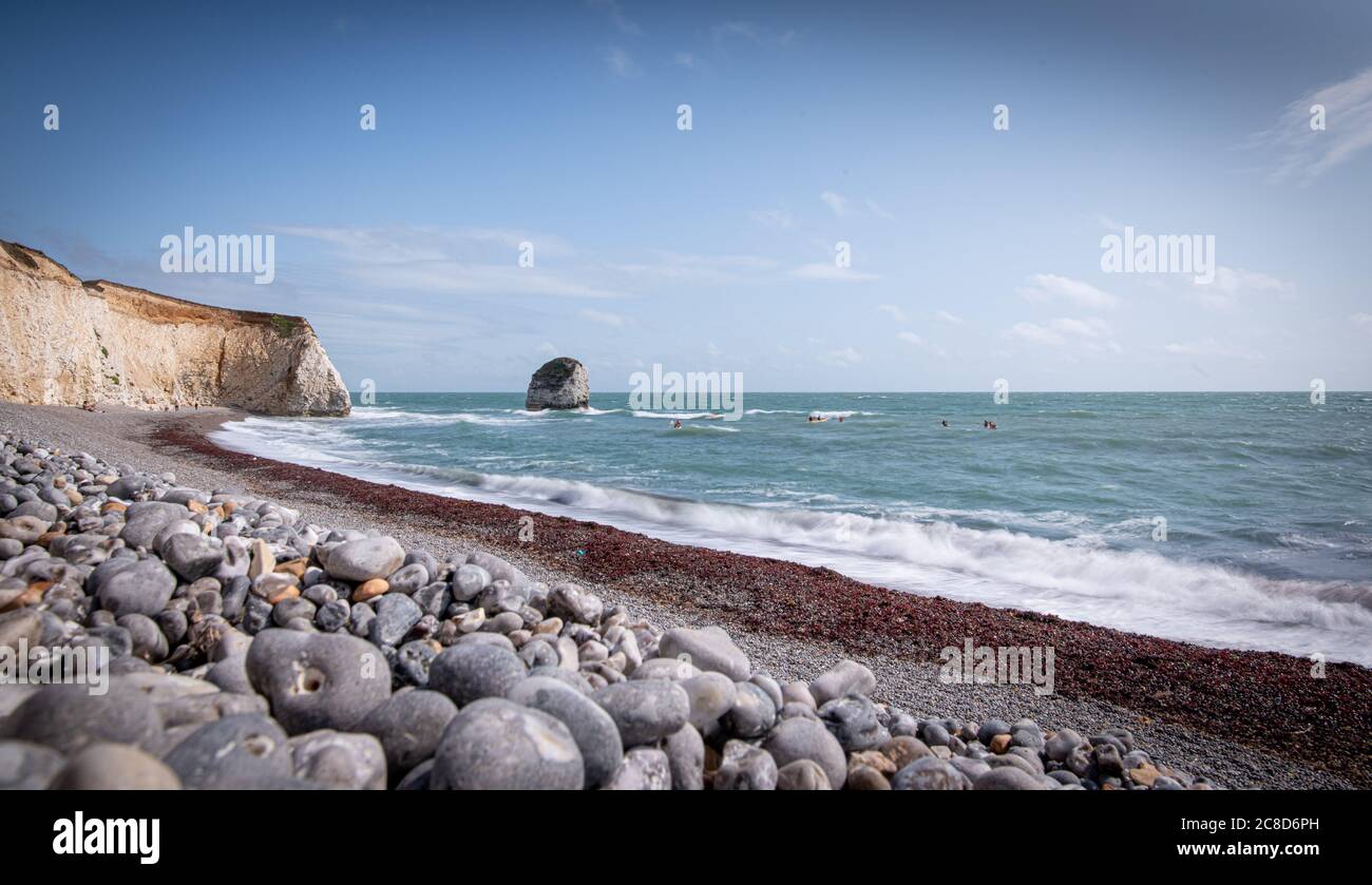 Pebble beach and ocean scene Stock Photo - Alamy