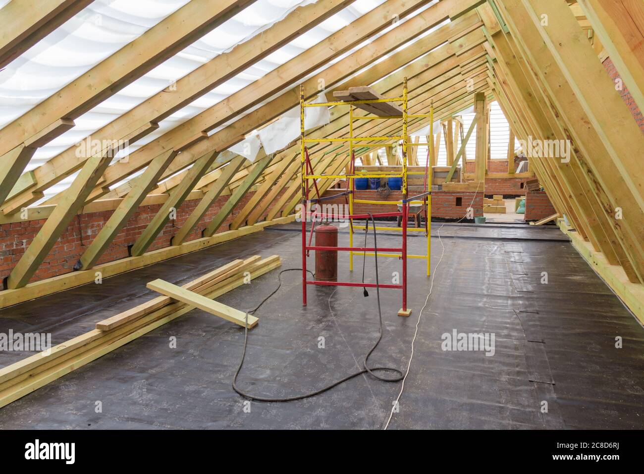 Wooden roof construction. Wooden House Frame. Roof support beams in ...