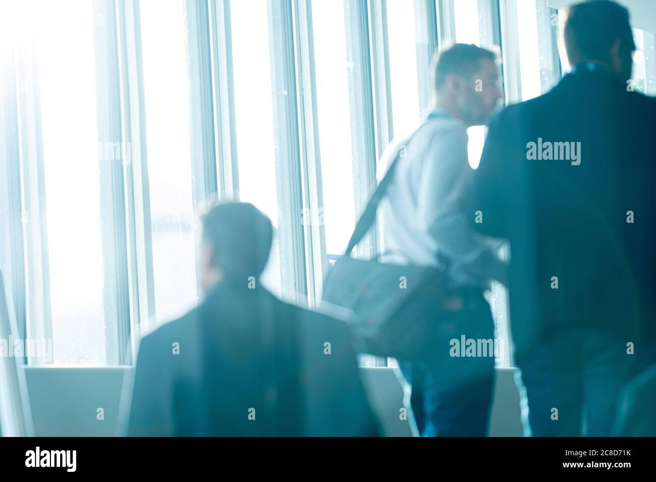 Business people arriving meeting hi-res stock photography and images ...