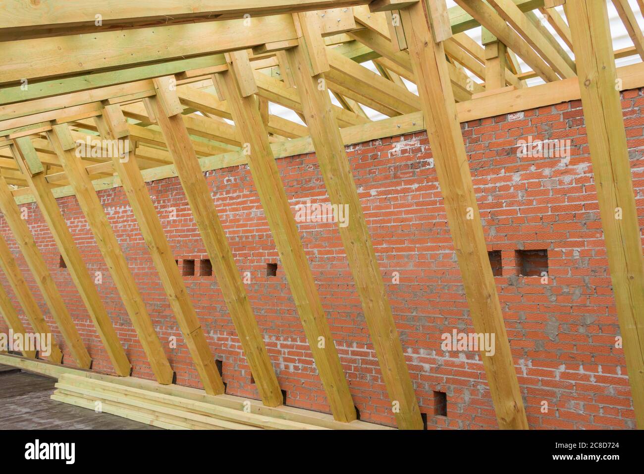 Rafter system of a wooden roof. Wooden construction. The construction ...