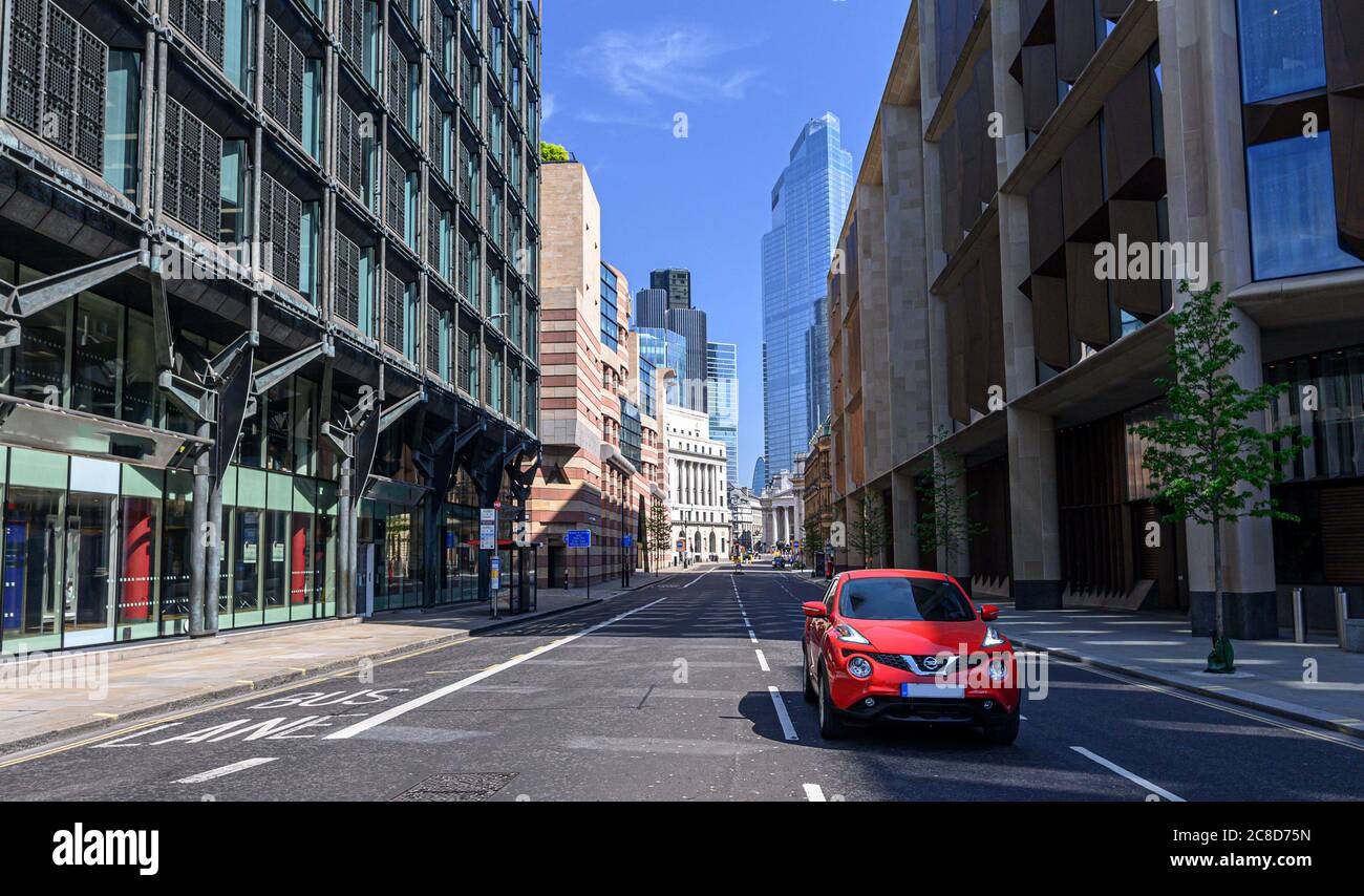 One Car Driving Through City of London Stock Photo - Alamy