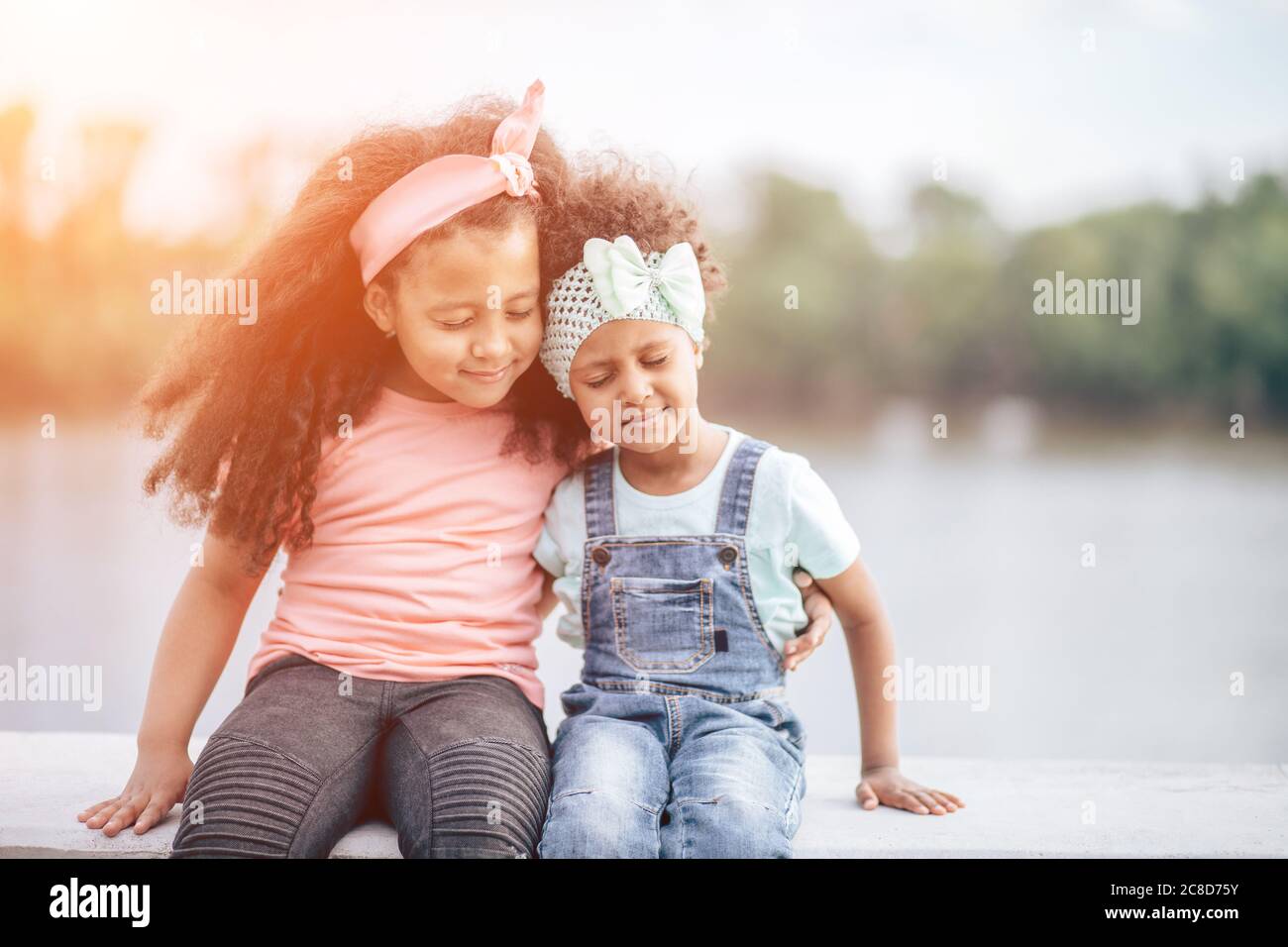 African sfriend children on background of natural. looking in side. The ...