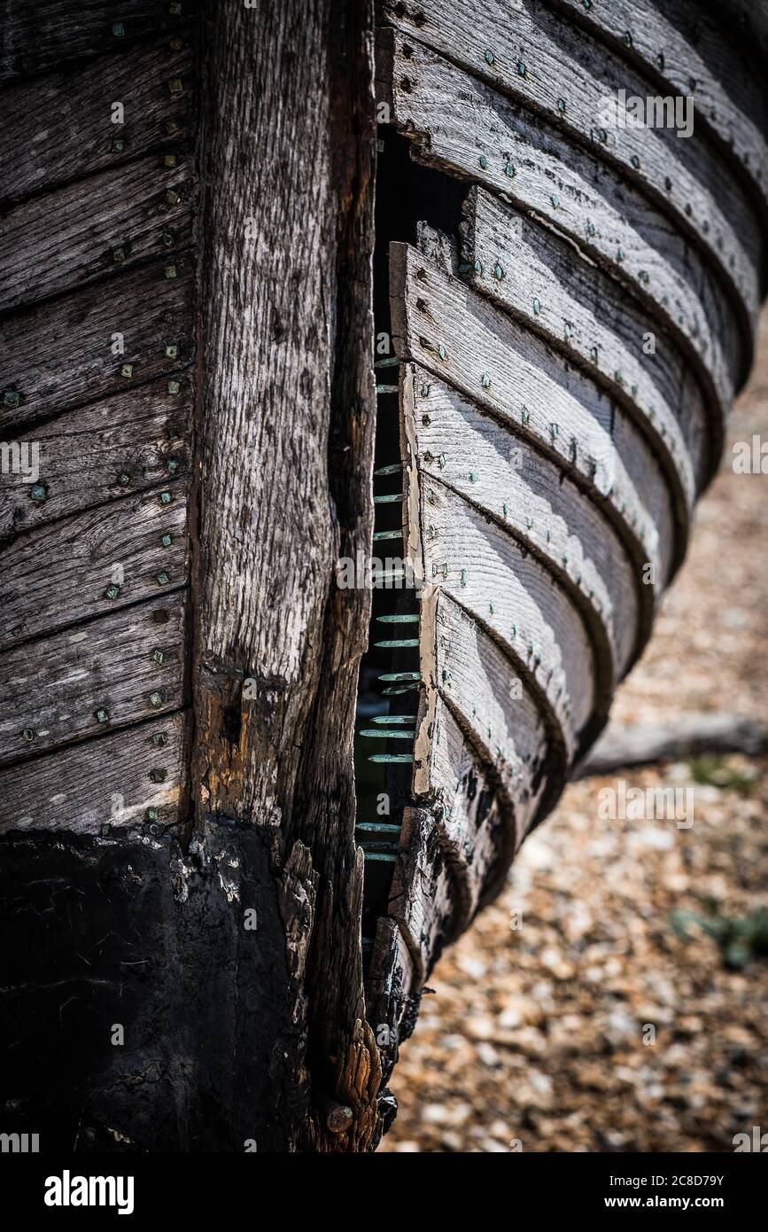 Derelict abandoned wooden fishing boat, gnarly wood & flaking paint on ...