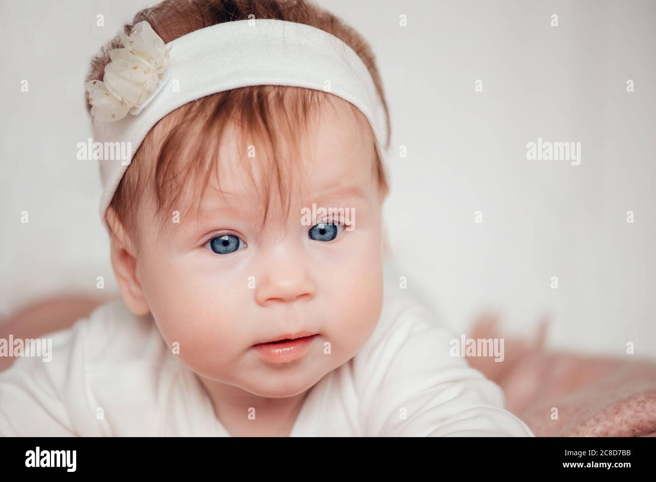 Beautiful baby few months old portrait outdoors Stock Photo - Alamy