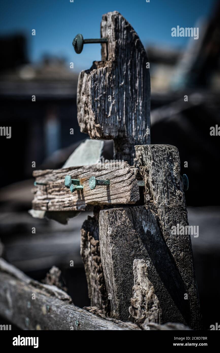 Derelict abandoned wooden fishing boat, gnarly wood & flaking paint on ...