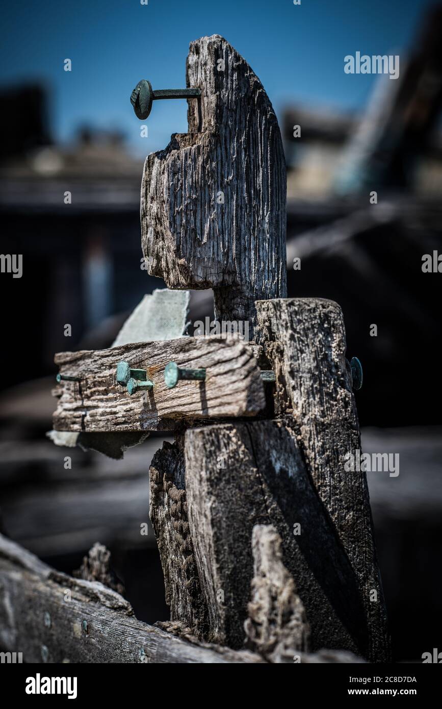 Derelict abandoned wooden fishing boat, gnarly wood & flaking paint on ...
