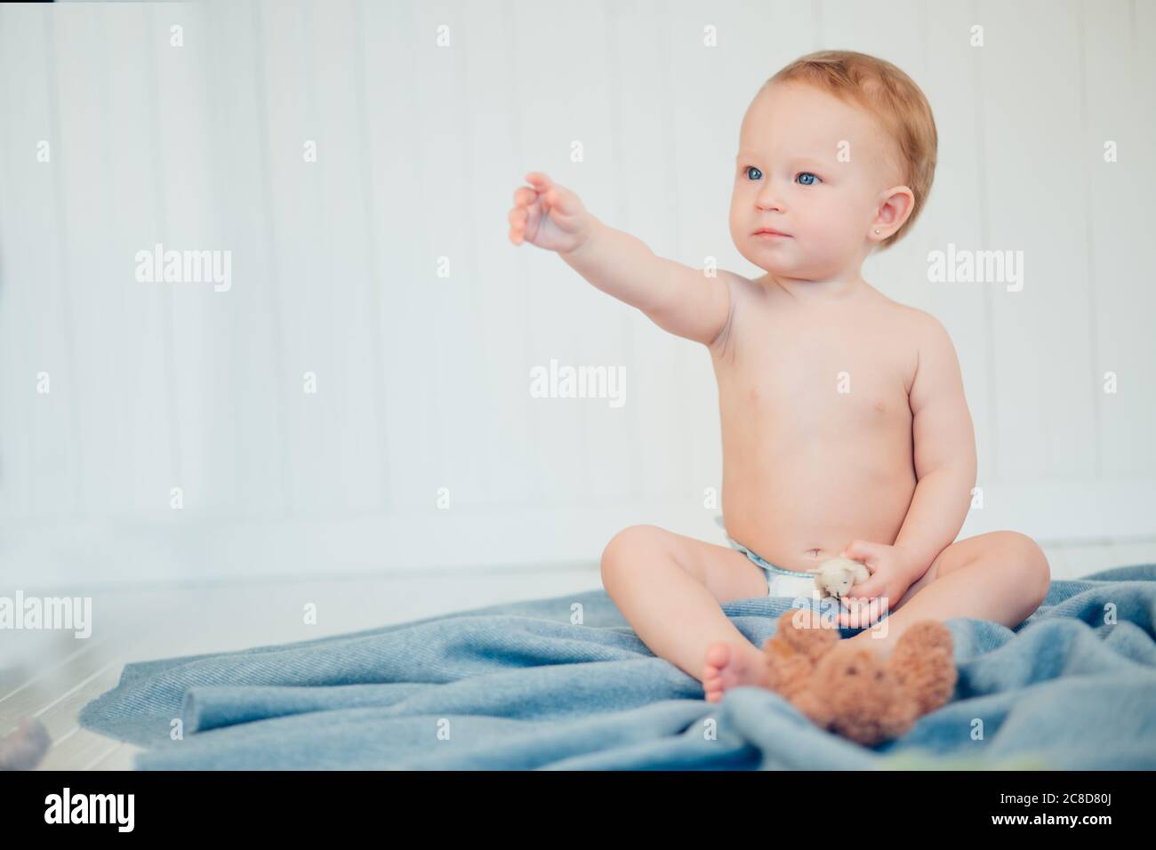 childhood, babyhood and people concept - happy little baby boy or girl ...