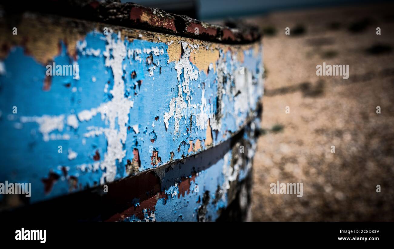 Derelict abandoned wooden fishing boat, gnarly wood & flaking paint on ...
