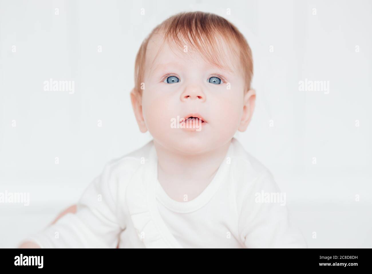 Beautiful baby few months old portrait outdoors Stock Photo - Alamy