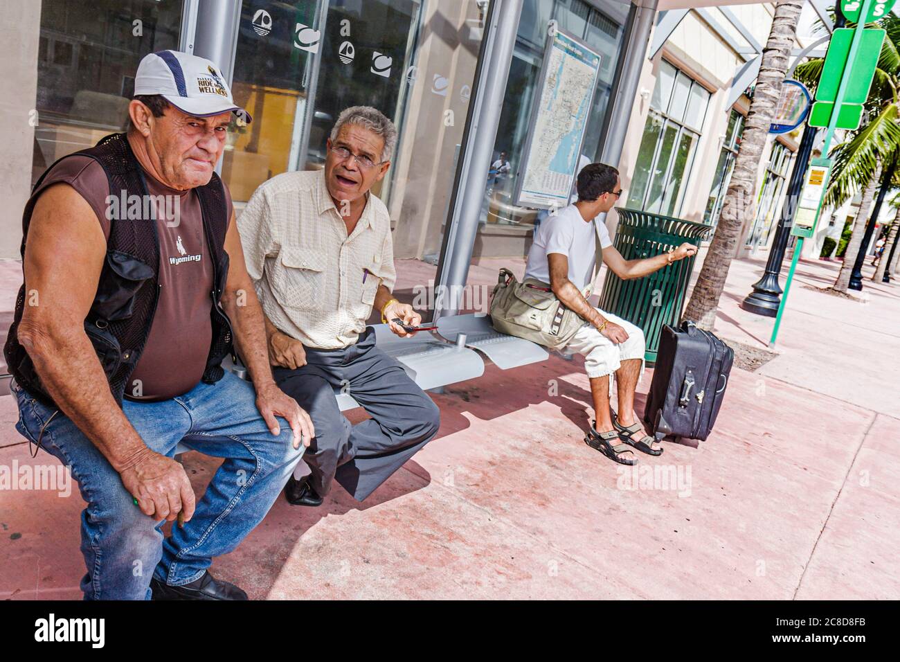 Miami Beach Florida,bus stop,shelter,public transportation,Hispanic ...