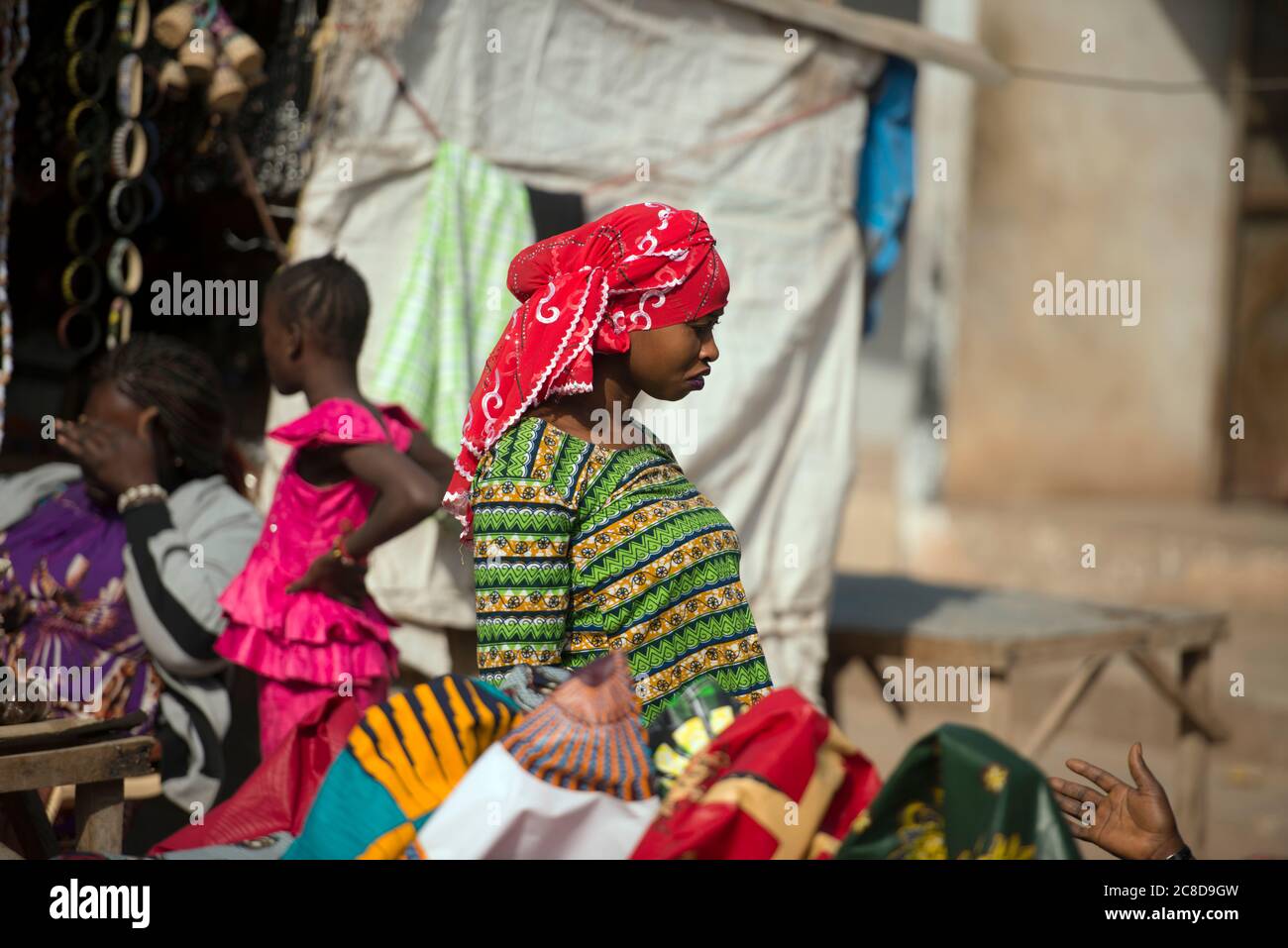 An indigenous, ethnic Jola woman at a market in Senegal, West Africa ...