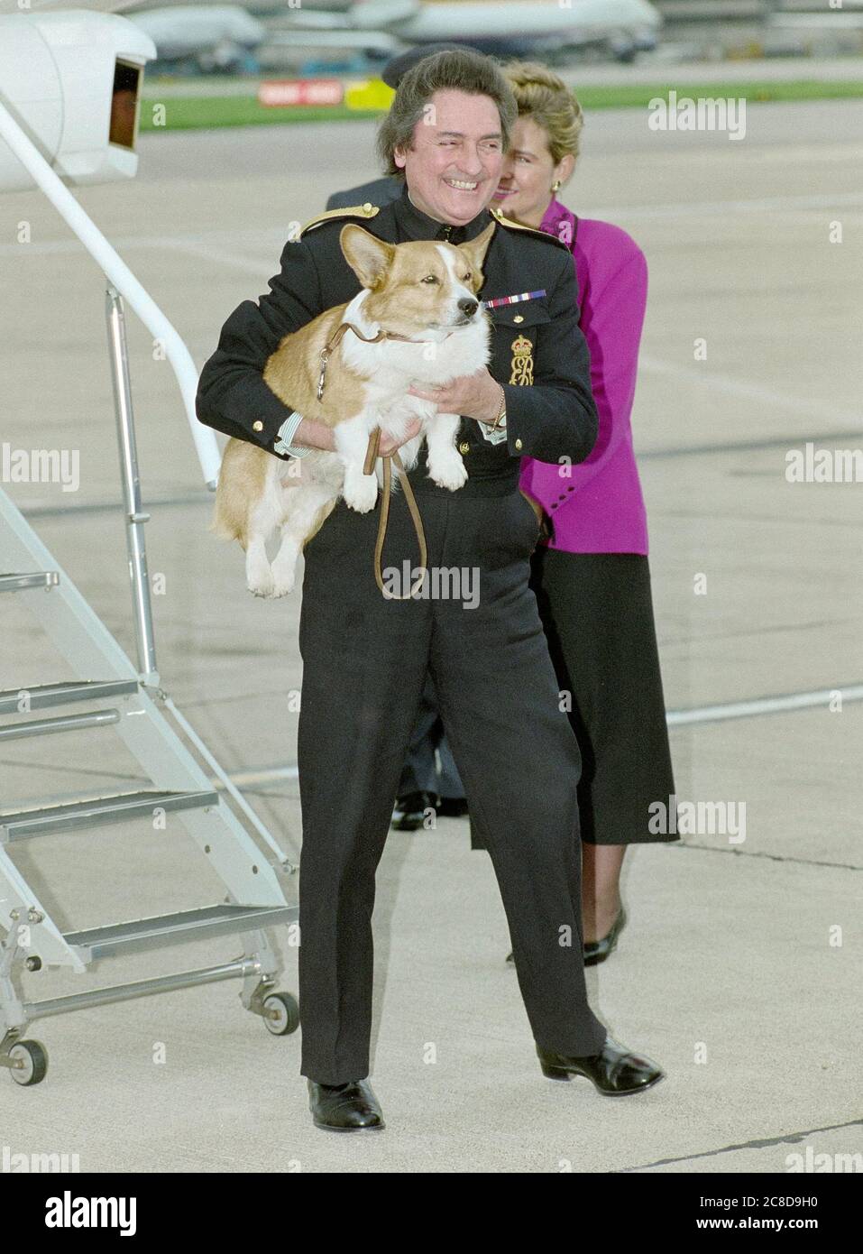 HM Queen Elizabeth The Queen Mother returning London with her pet ...