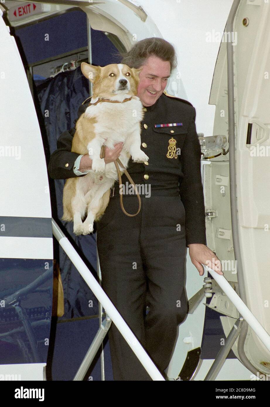 HM Queen Elizabeth The Queen Mother returning London with her pet ...