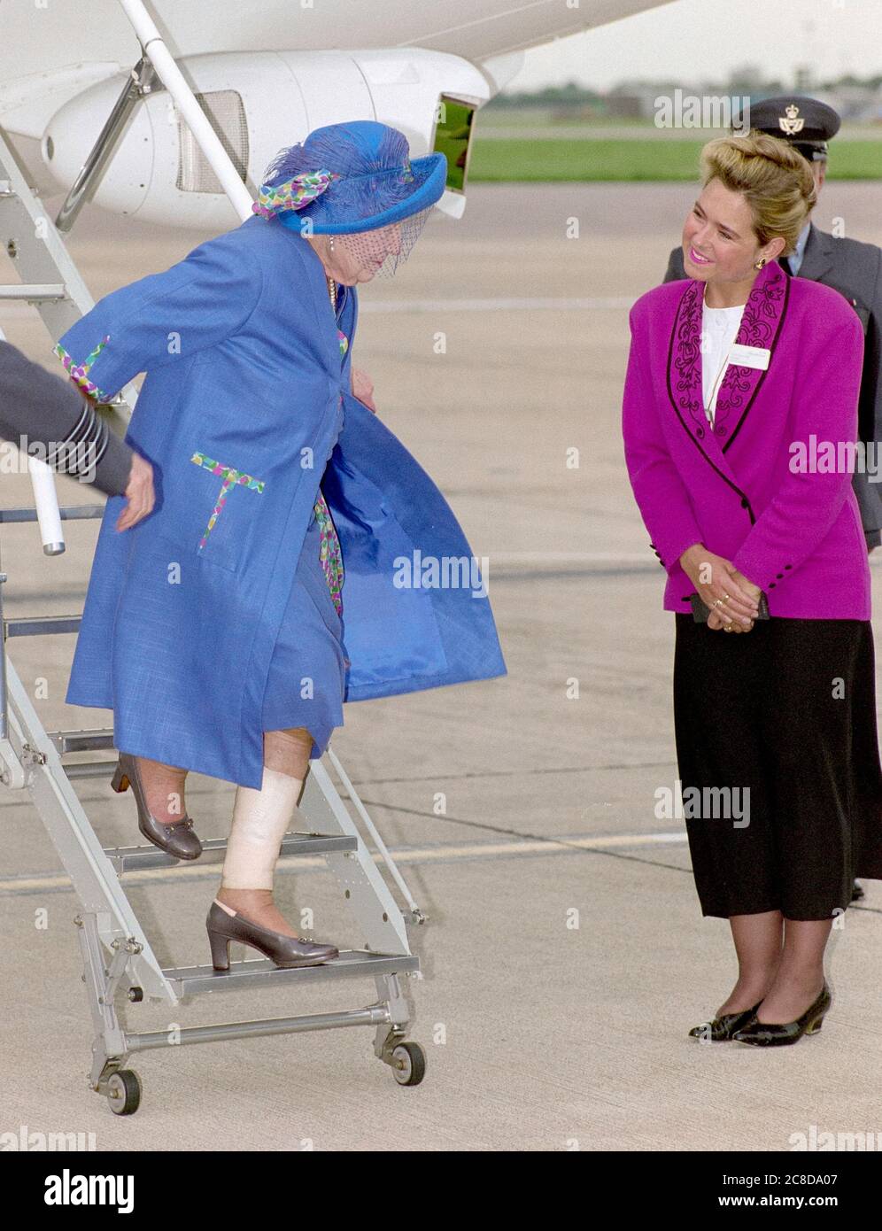 HM Queen Elizabeth The Queen Mother returning London with her pet ...