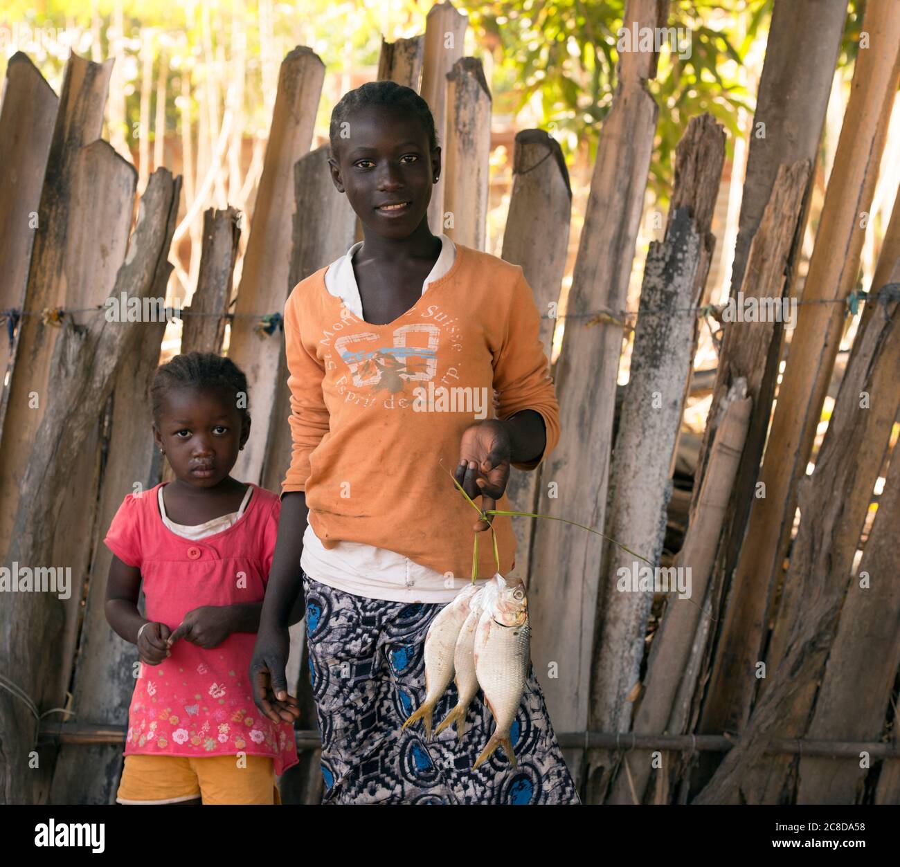 A young, indigenous Jola girl has been fishing near her village in The ...