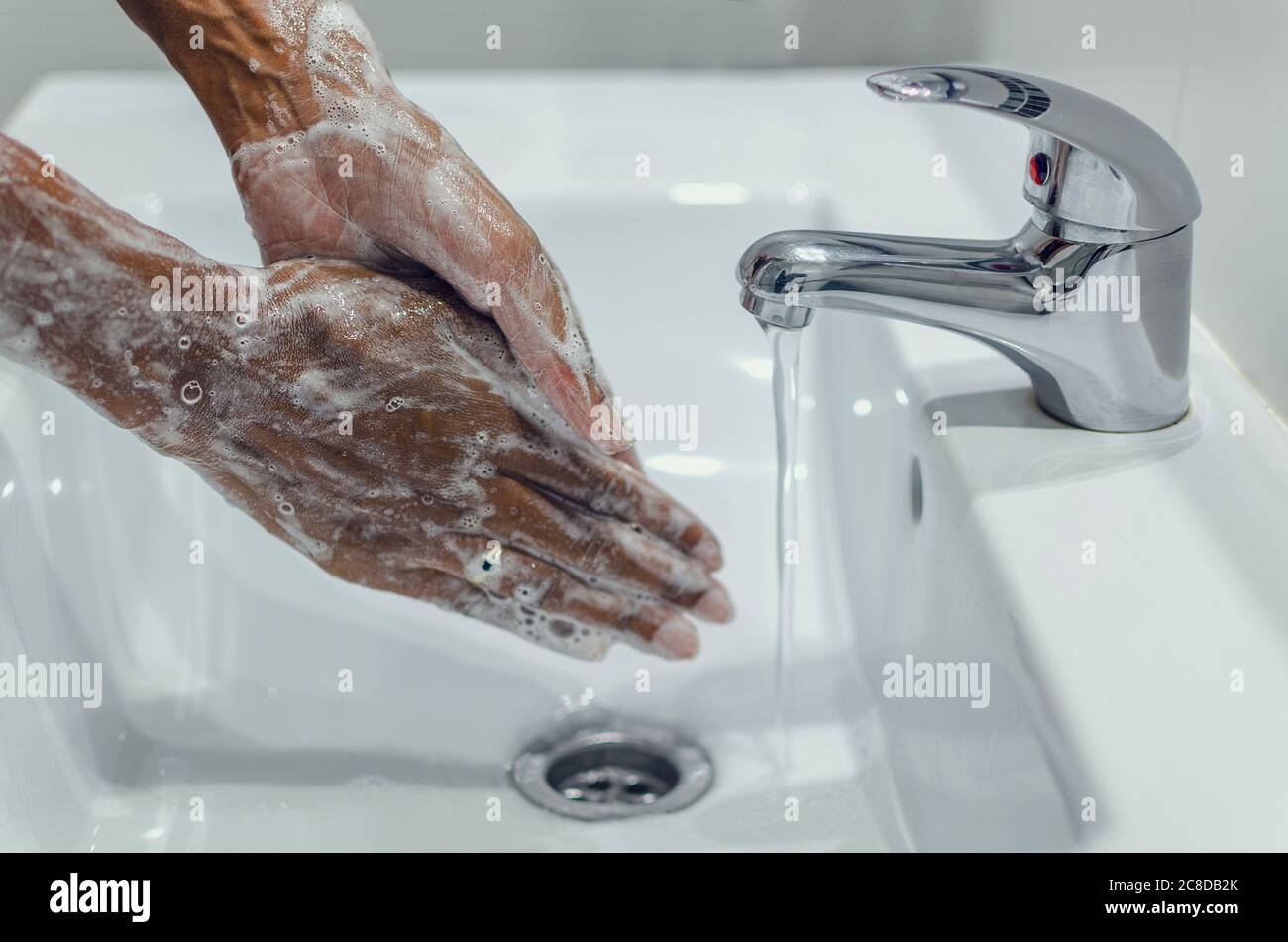 Woman rubbing hands together hi-res stock photography and images - Alamy