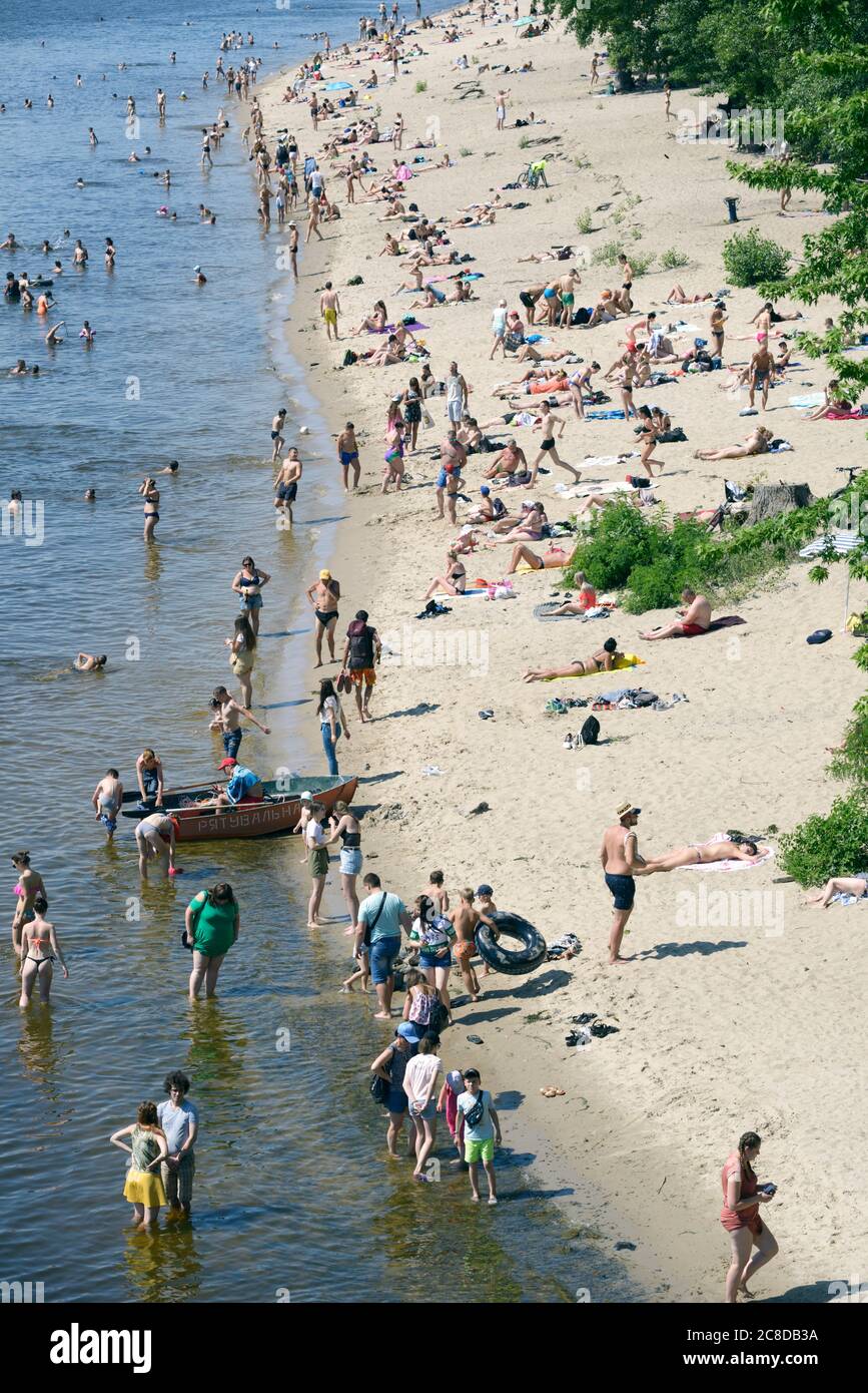 People sunbathing on a beach of the Dnieper river Stock Photo - Alamy