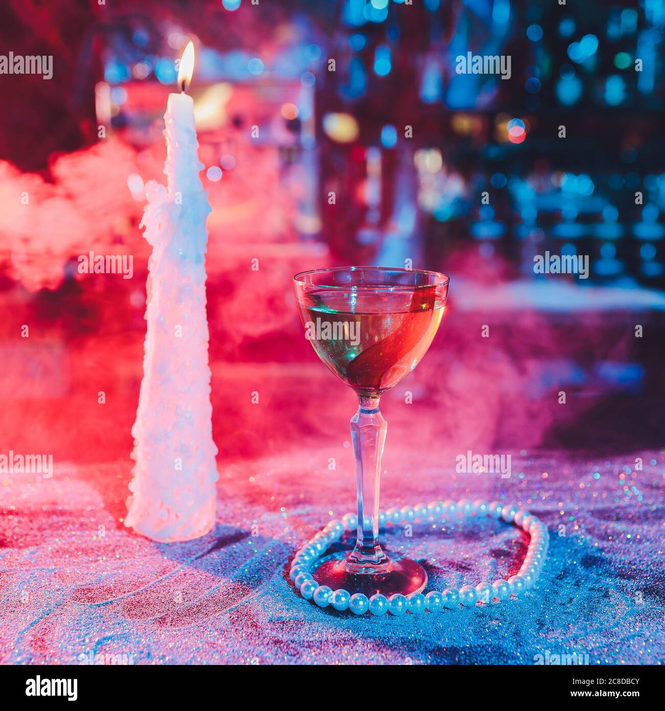 bright cocktail in a beautiful glass neon lighting background Stock ...