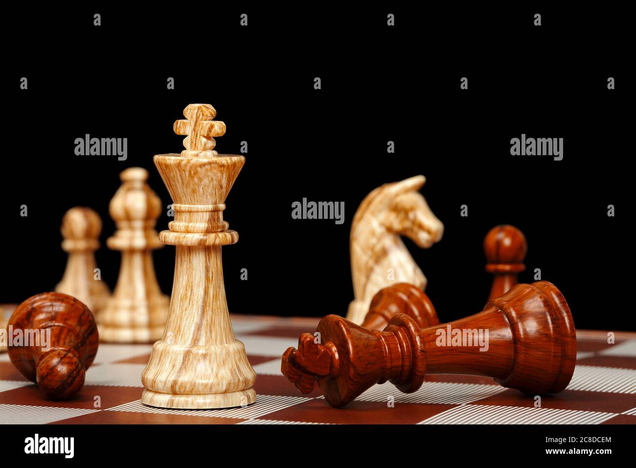 checkmate for the white team on black background Stock Photo - Alamy