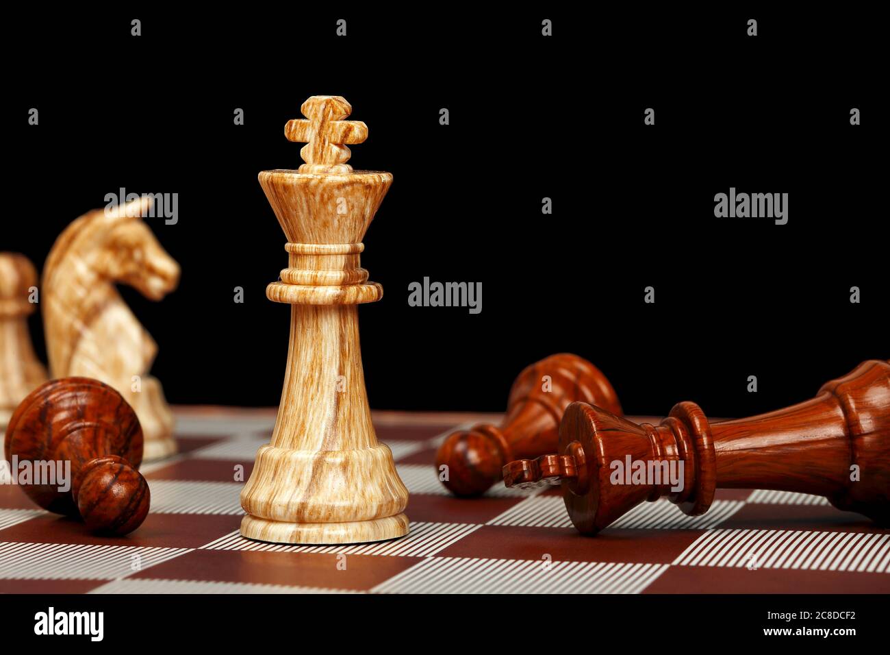checkmate for the white team on black background Stock Photo - Alamy