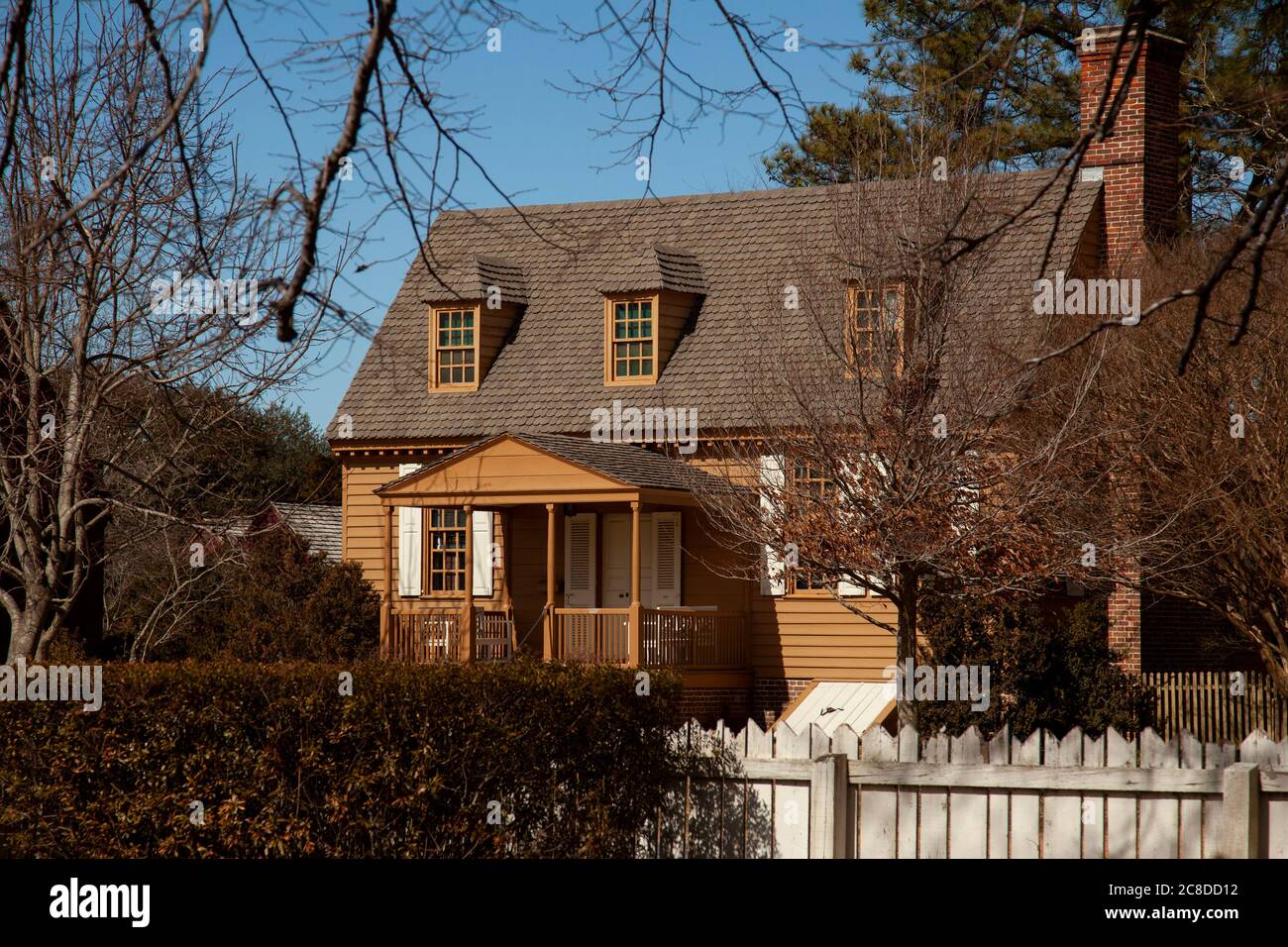 Virginia, USA 02/24/2014: A colonial era house with brick chimney ...