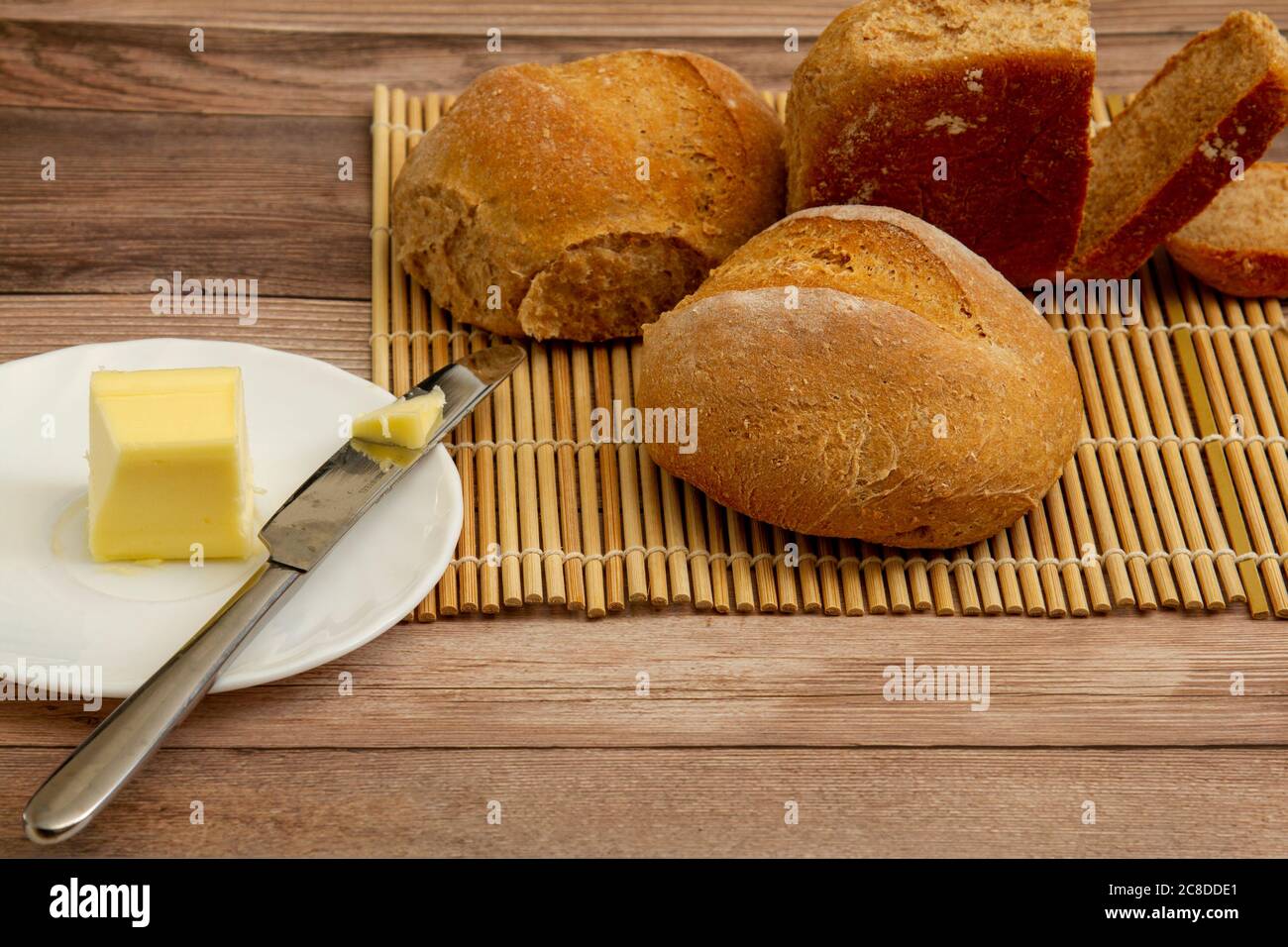close up image of home made whole wheat bread loaves fresh out of oven ...