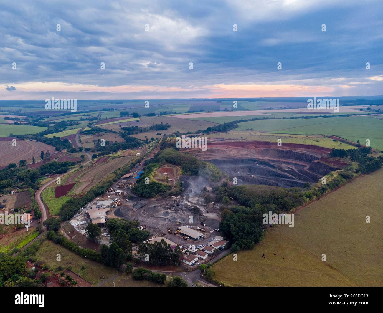 Aerial plant view of a quarry, stone factory on a cloudy evening Stock ...