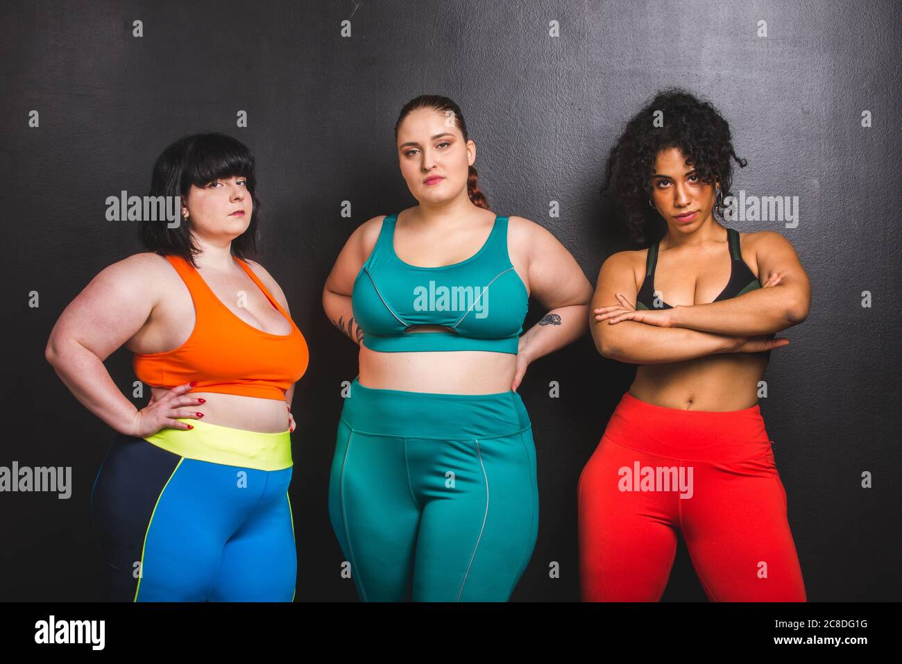 Group of 3 oversize women posing in studio - Beautiful girls accepting ...