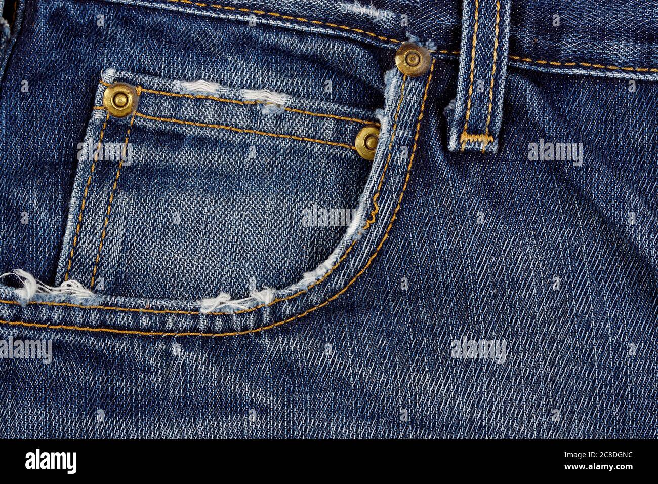 frayed jeans pocket closeup for backgrounds Stock Photo - Alamy