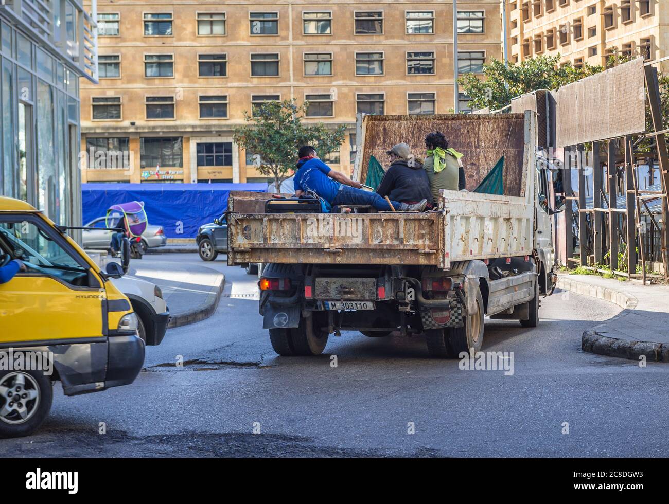 Construction workers on a truck in dwontown of Beirut, Lebanon Stock ...
