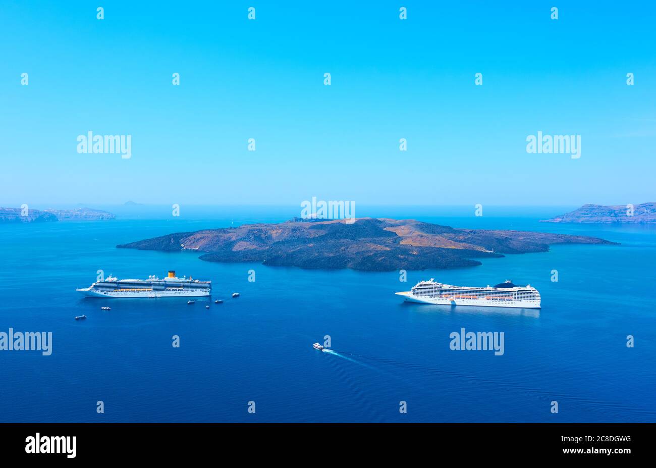 View of Aegean Sea with cruise ships from Santorini island in Greece ...