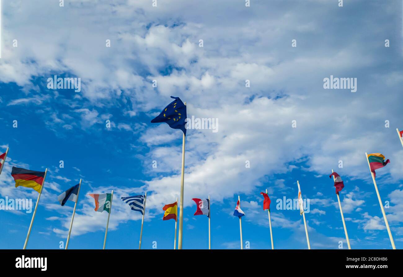 Flags Of European Countries on Flagpoles against a cloudy sky Stock ...