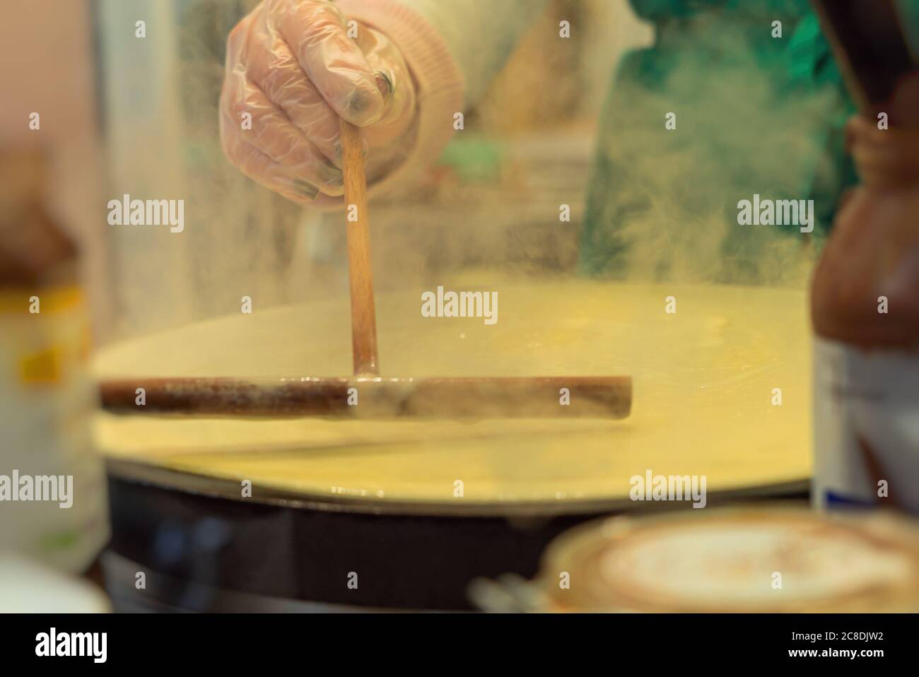 French pancake cooking process. Street food in Paris Stock Photo - Alamy
