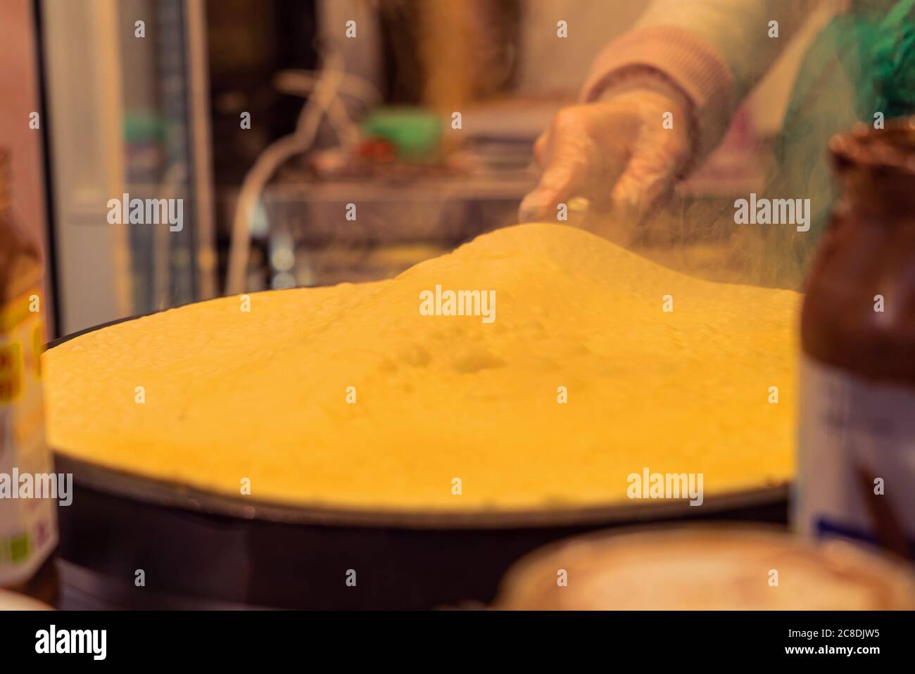 French pancake cooking process. Street food in Paris Stock Photo - Alamy