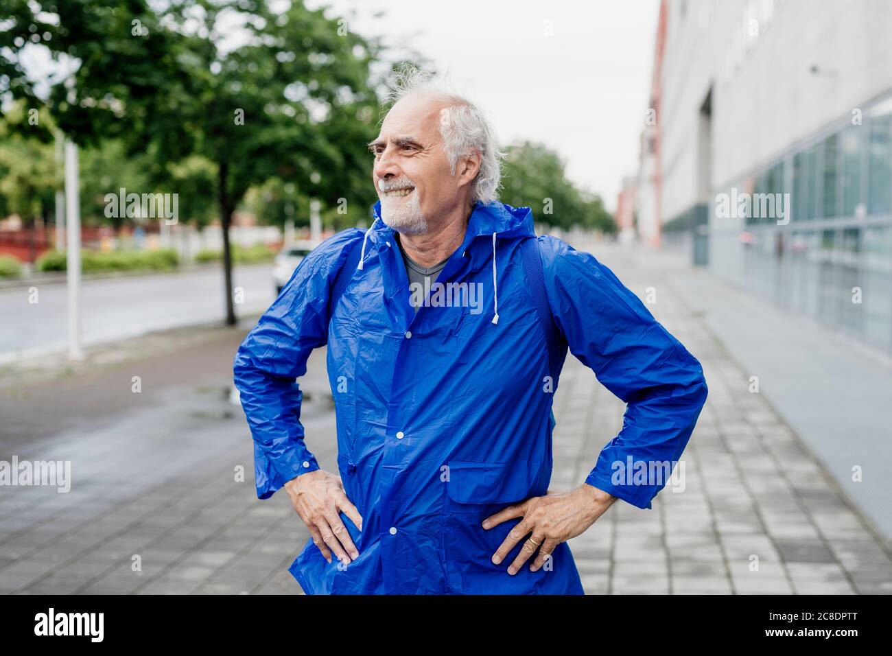 Man in the raincoat hi-res stock photography and images - Alamy