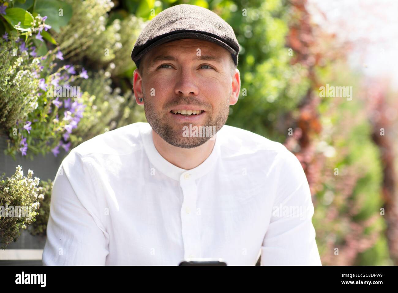 Male wearing cap hi-res stock photography and images - Alamy