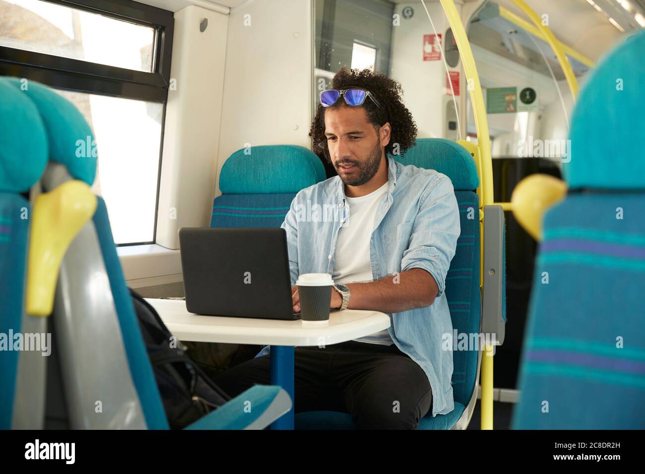 Laptop man transport hi-res stock photography and images - Alamy