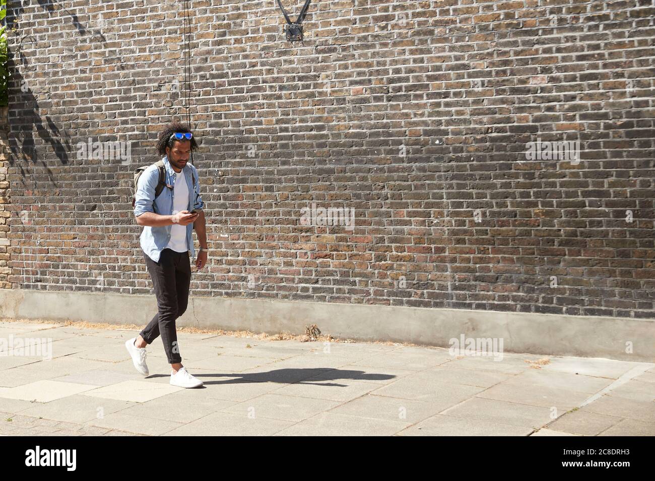 Walking on brick pavement hi-res stock photography and images - Alamy