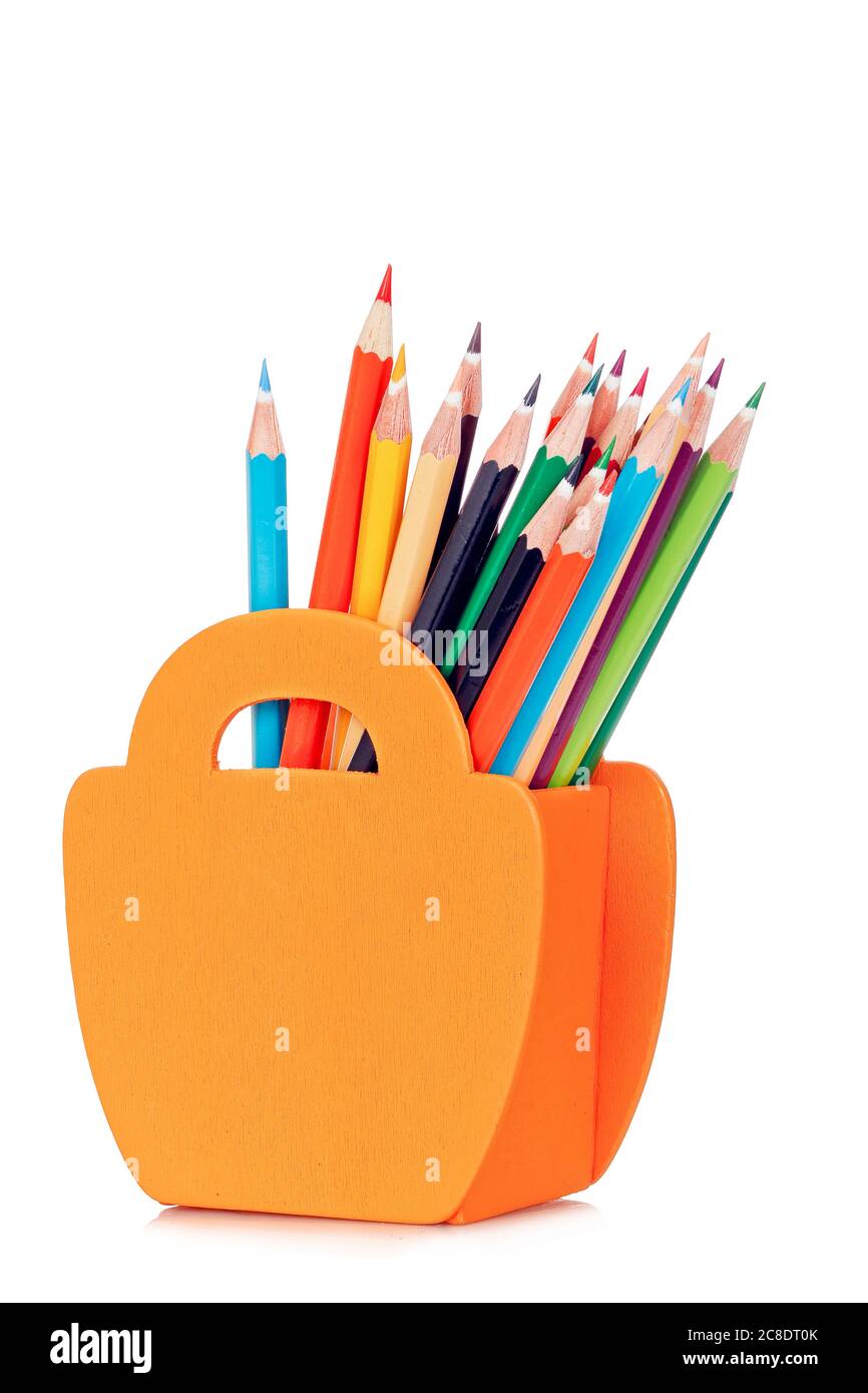 color pencils in wooden basket-shaped pencil case Stock Photo - Alamy