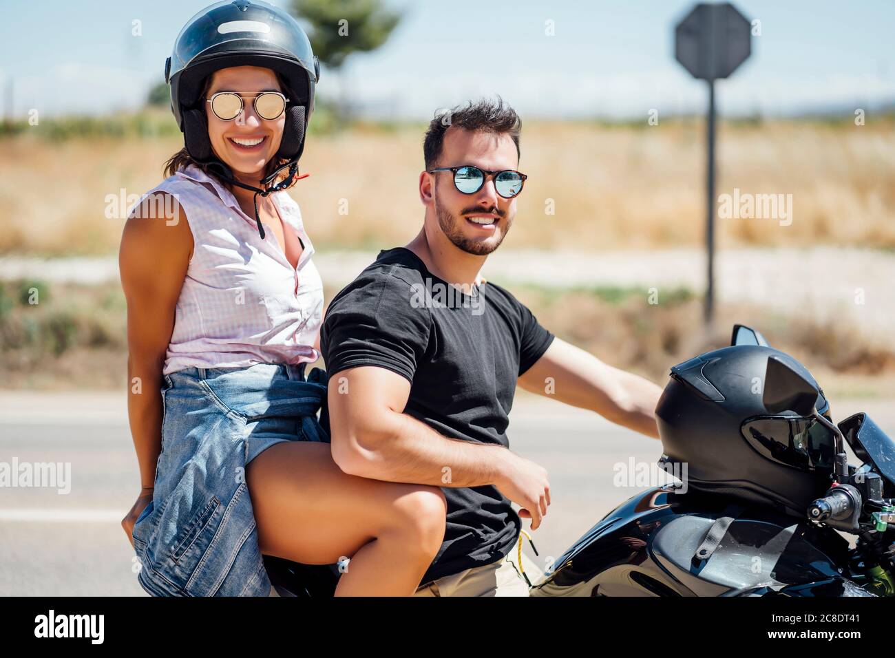 Sitting on a motorbike hi-res stock photography and images - Alamy