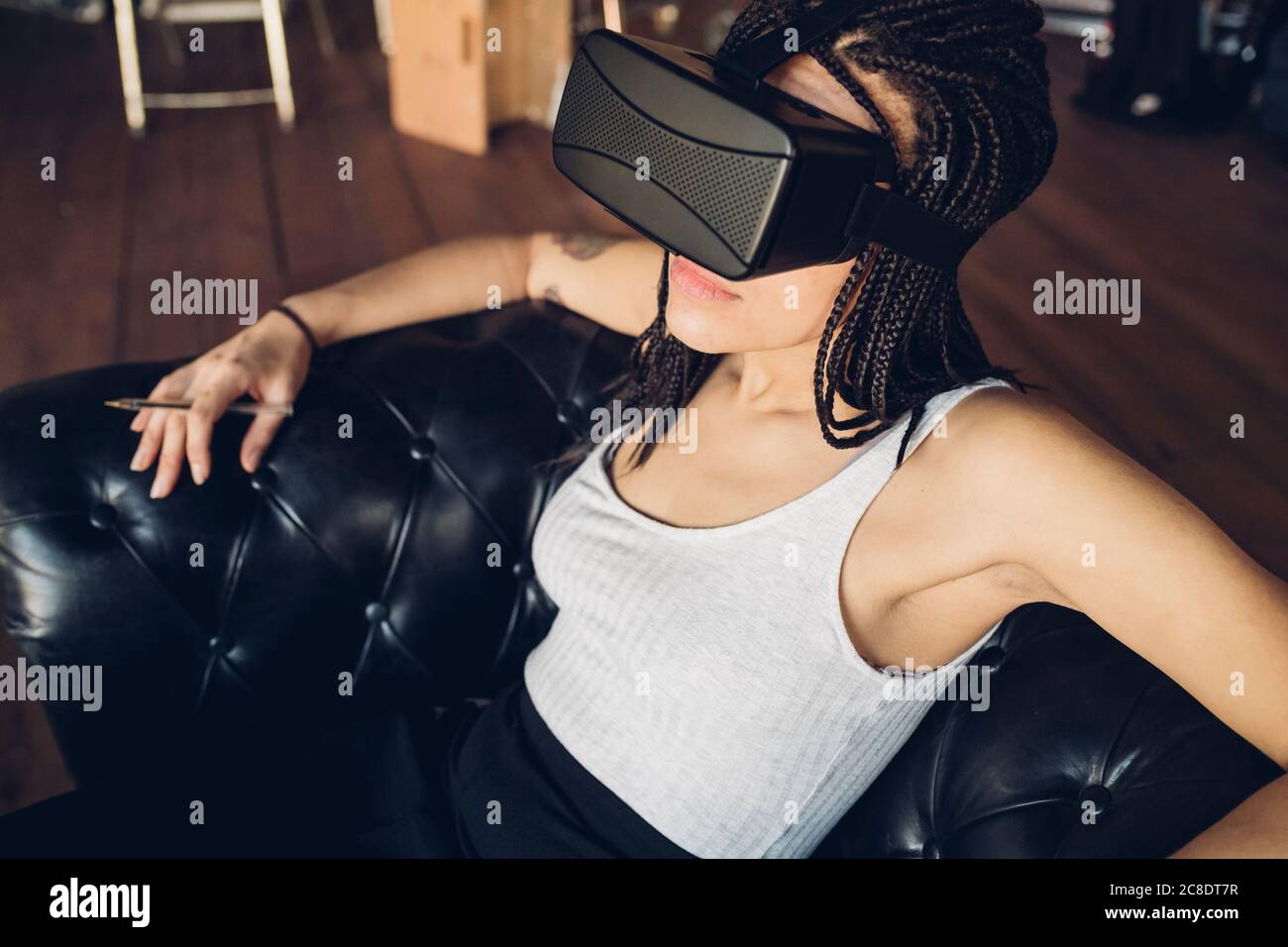 Woman wearing glasses braids hi-res stock photography and images - Alamy