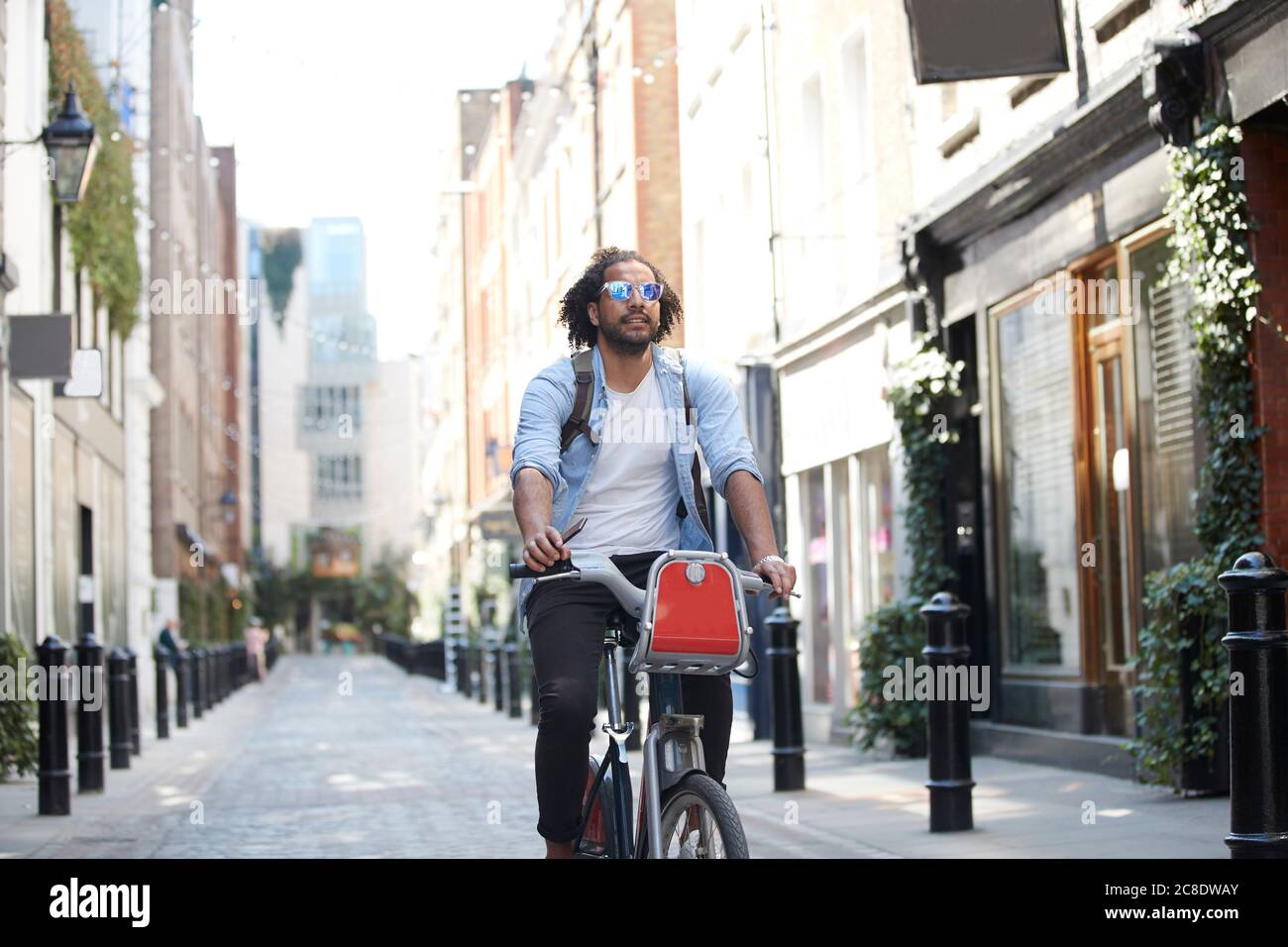 Portrait lifestyles man bike hi-res stock photography and images - Alamy